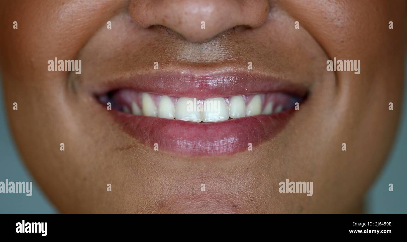 Black woman lips and mouth macro close-up smiling. African american ...