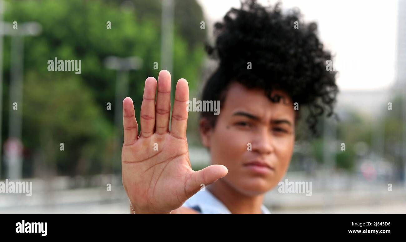 Blackoman annoyed making stop sign with hand, saying no, expressing ...
