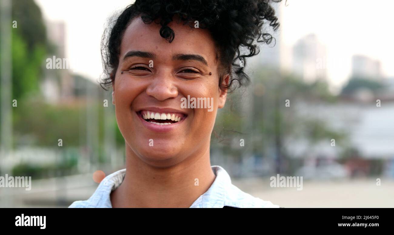Happy joyful young woman spontaneous smile and laugh Stock Photo - Alamy