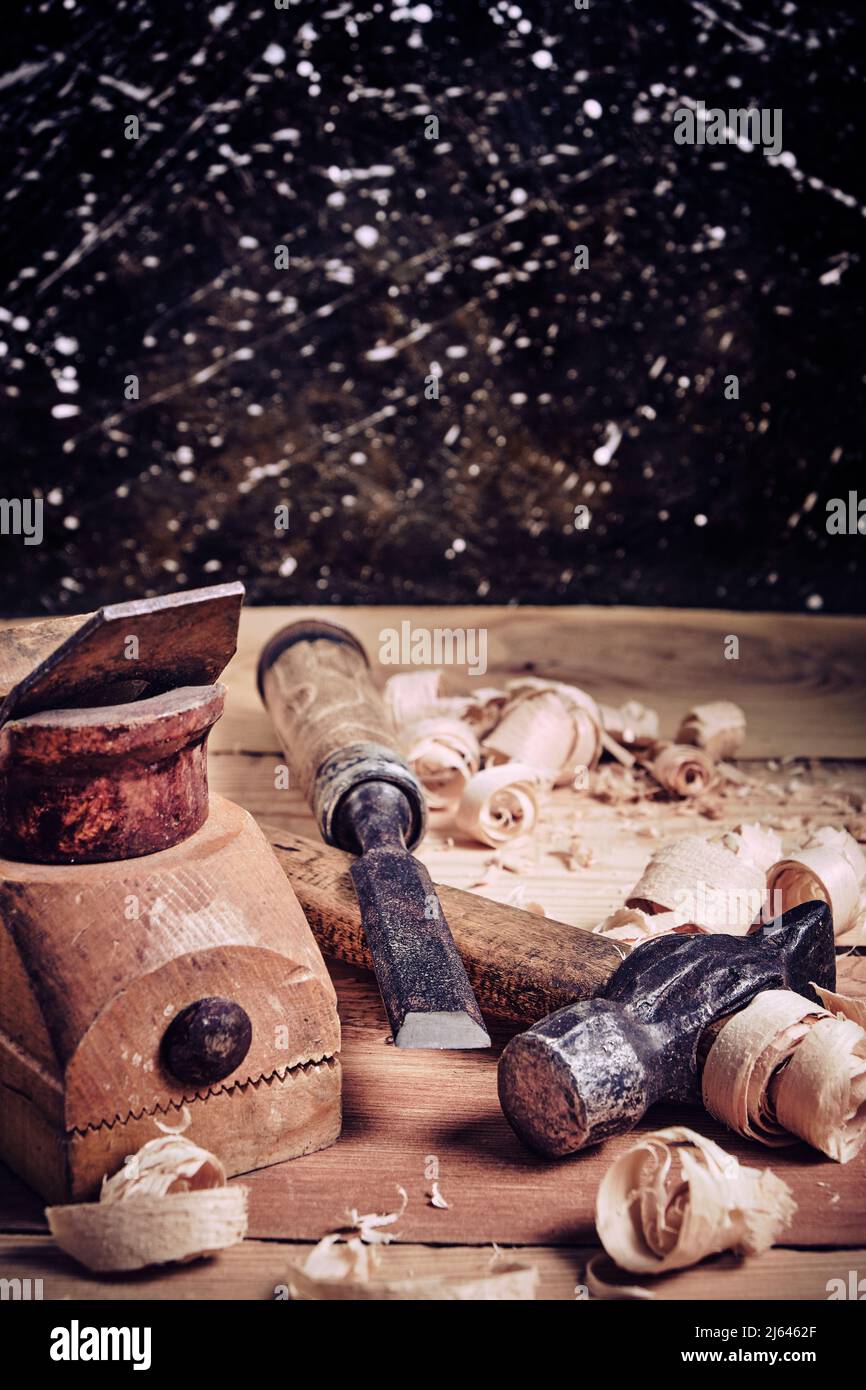 Set of tools for carpenters, hammer, chisel and plane on wooden ...