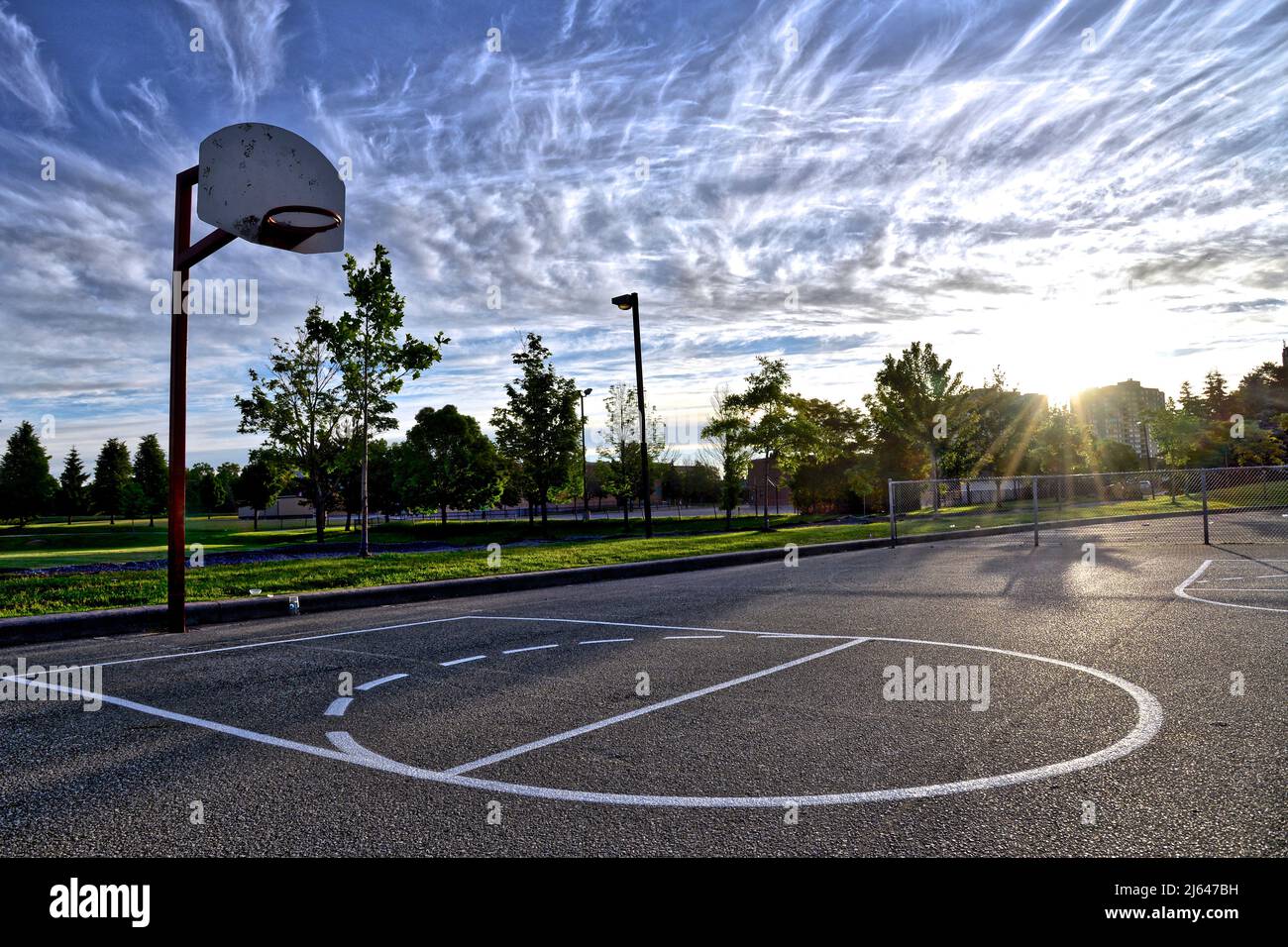 Sunset on a basketball court with the clear blue sky background Stock ...