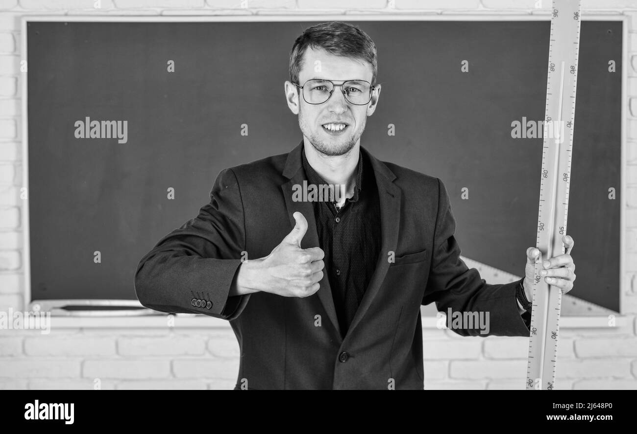 mathematics and people concept. man at blackboard. back to school ...