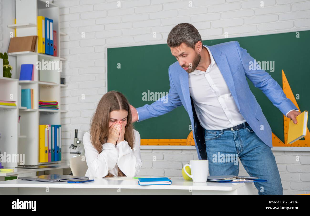 child study in classroom with angry teacher Stock Photo - Alamy