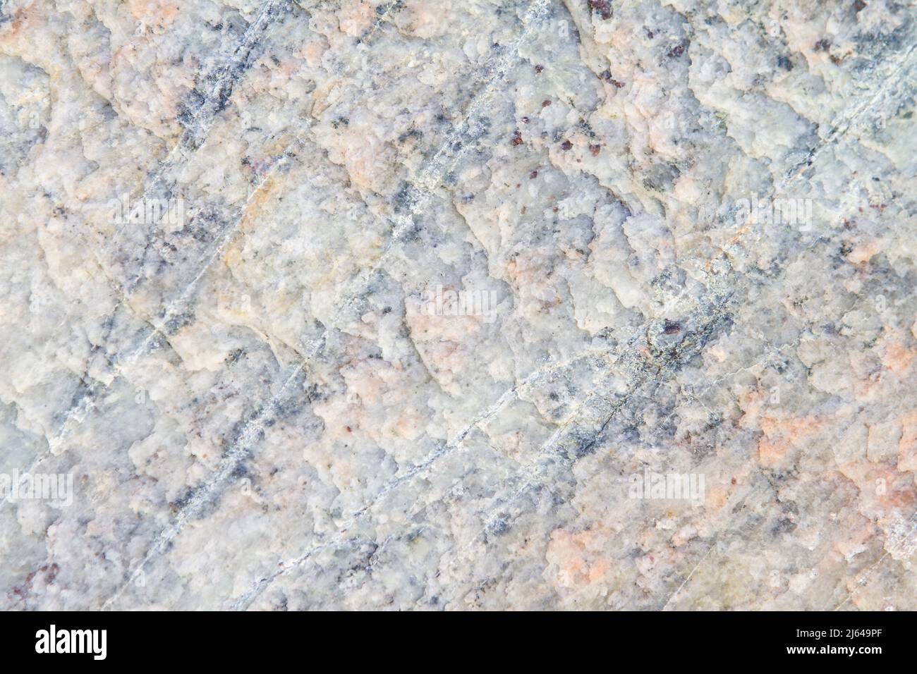 Closeup photograph of highly textured light colored decorative rock ...