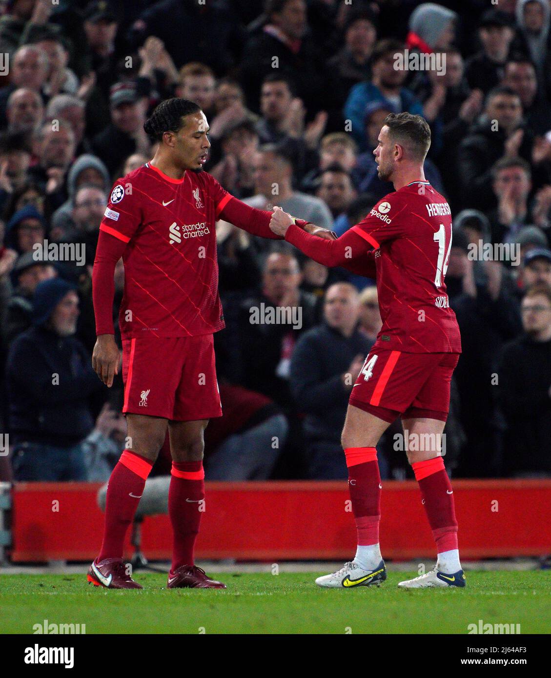 Liverpools jordan henderson passes captains armband hi-res stock ...