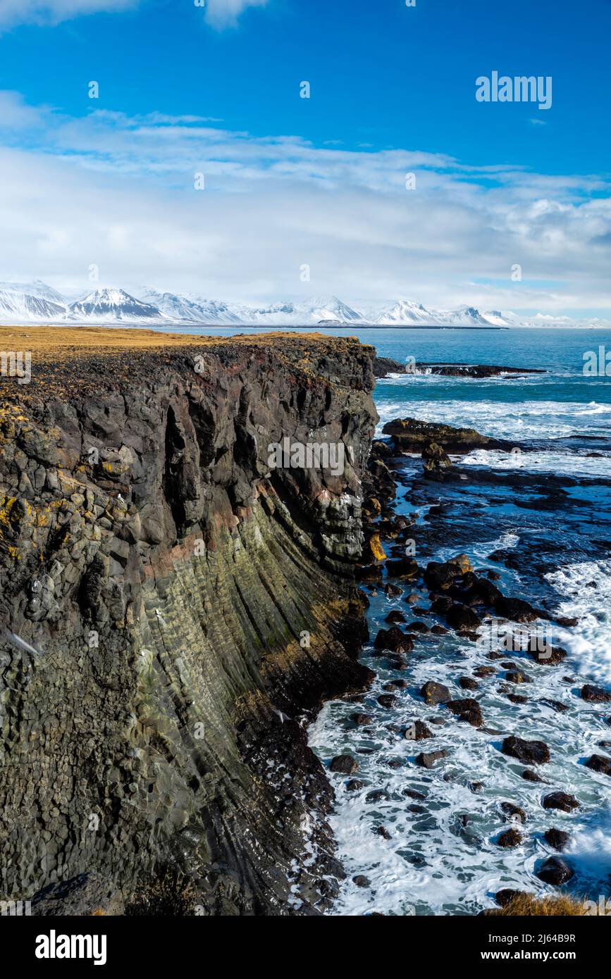 Photograph of the volcanic rock bridge at the Gatklettur Cliff walk ...
