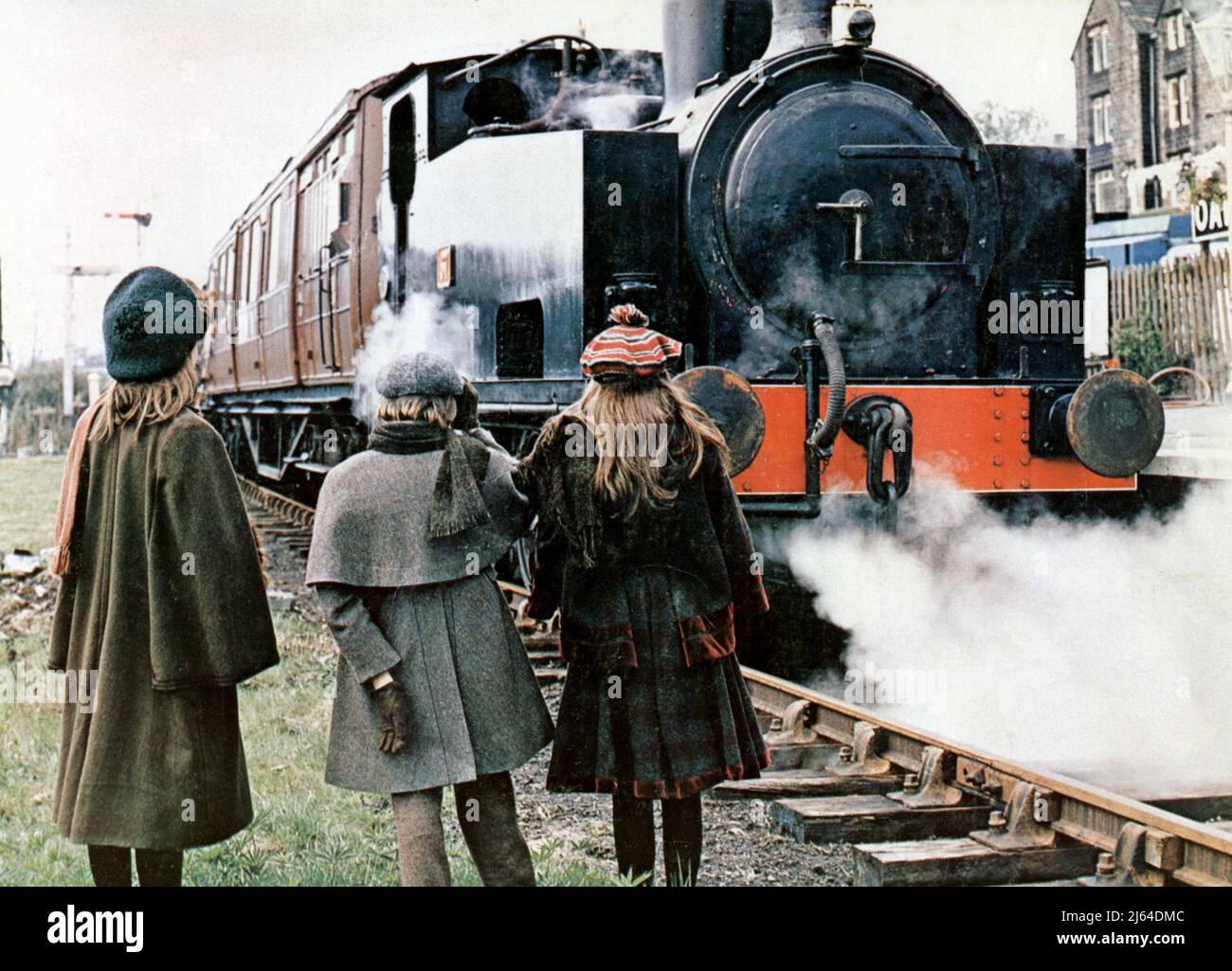 Children watch train leave as their father is on board hi-res stock ...