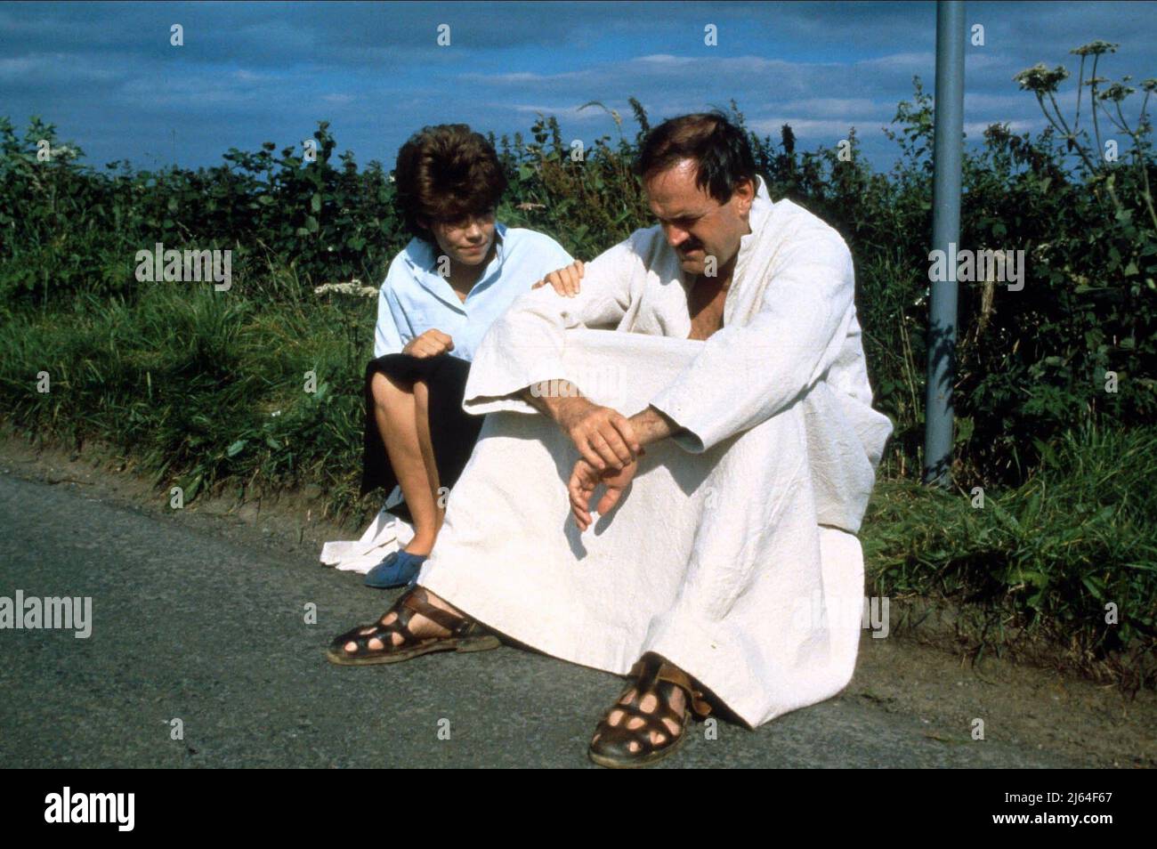 SHARON MAIDEN, JOHN CLEESE, CLOCKWISE, 1986 Stock Photo - Alamy