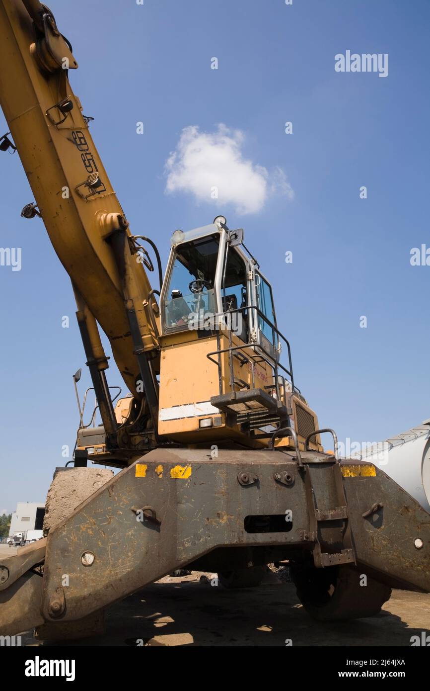 Steel wheeled material handler at a scrap metal recycling yard Stock ...