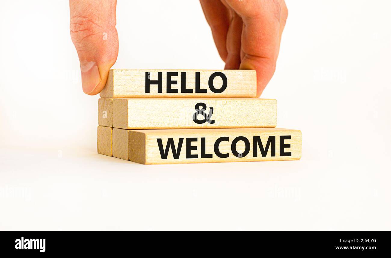 Hello and welcome symbol. Concept words Hello and welcome on wooden ...