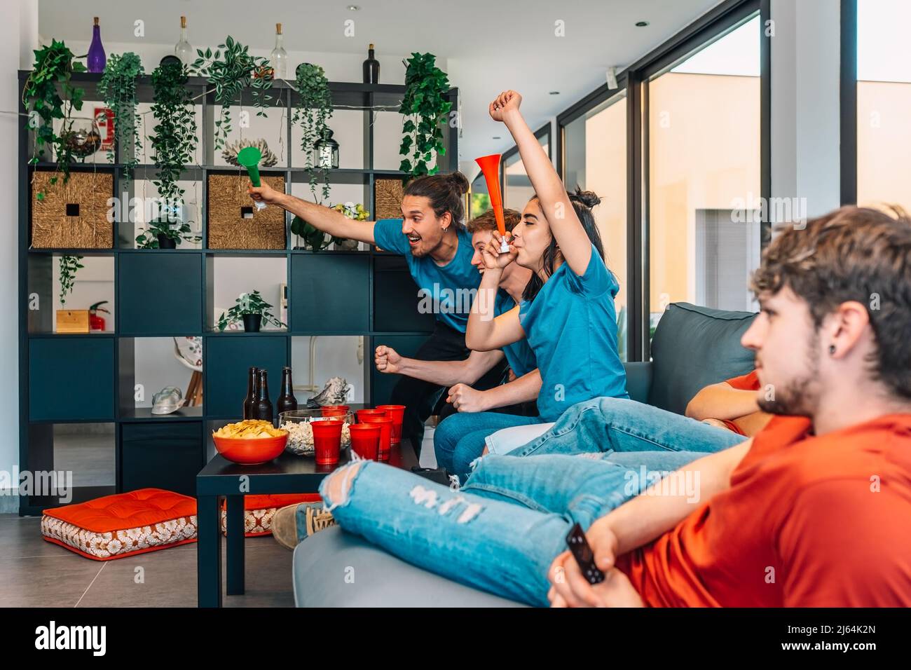 young friends competing on behalf of their sports team. friends ...