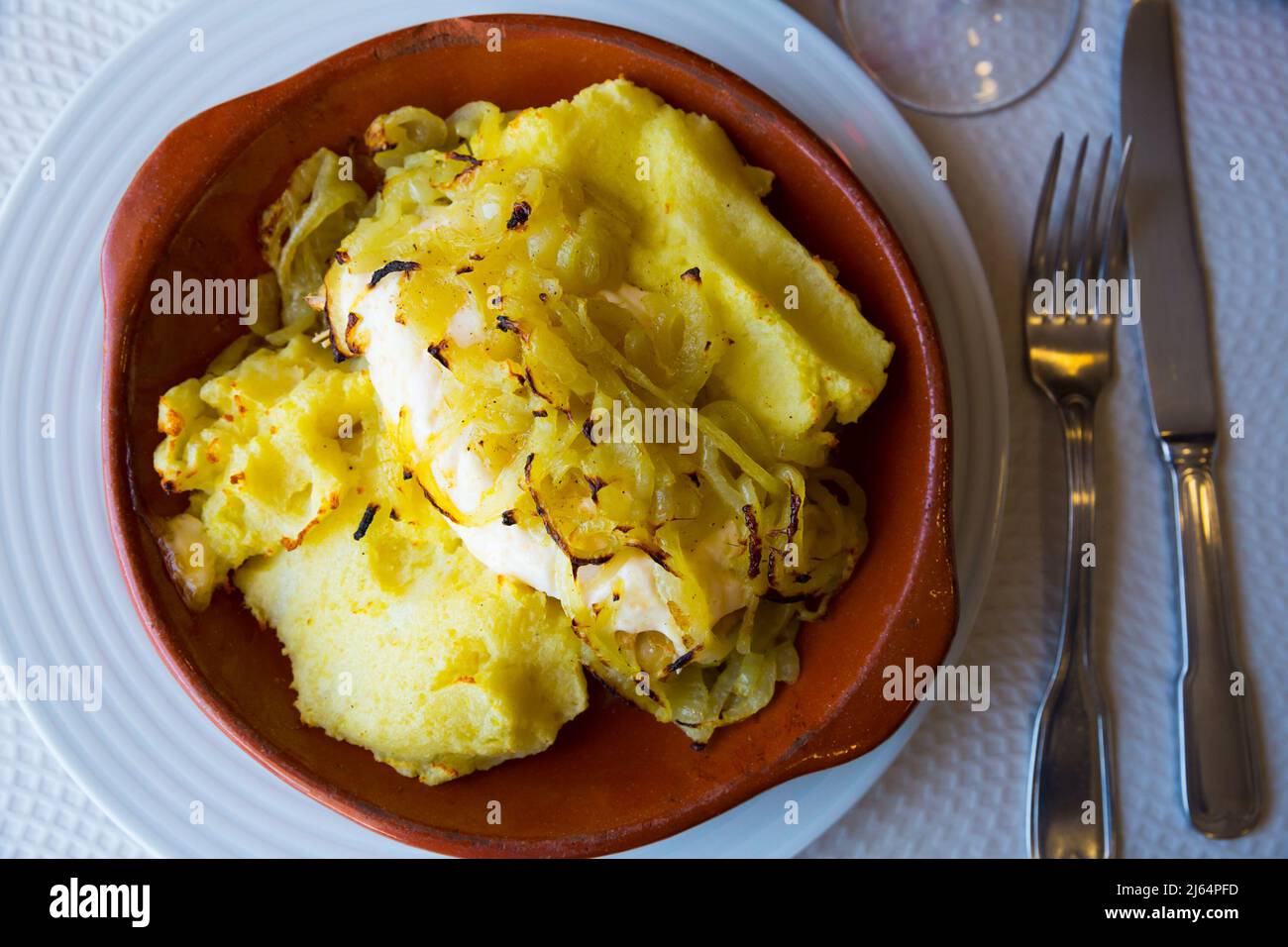 Baked cod potatoes onions hi-res stock photography and images - Alamy