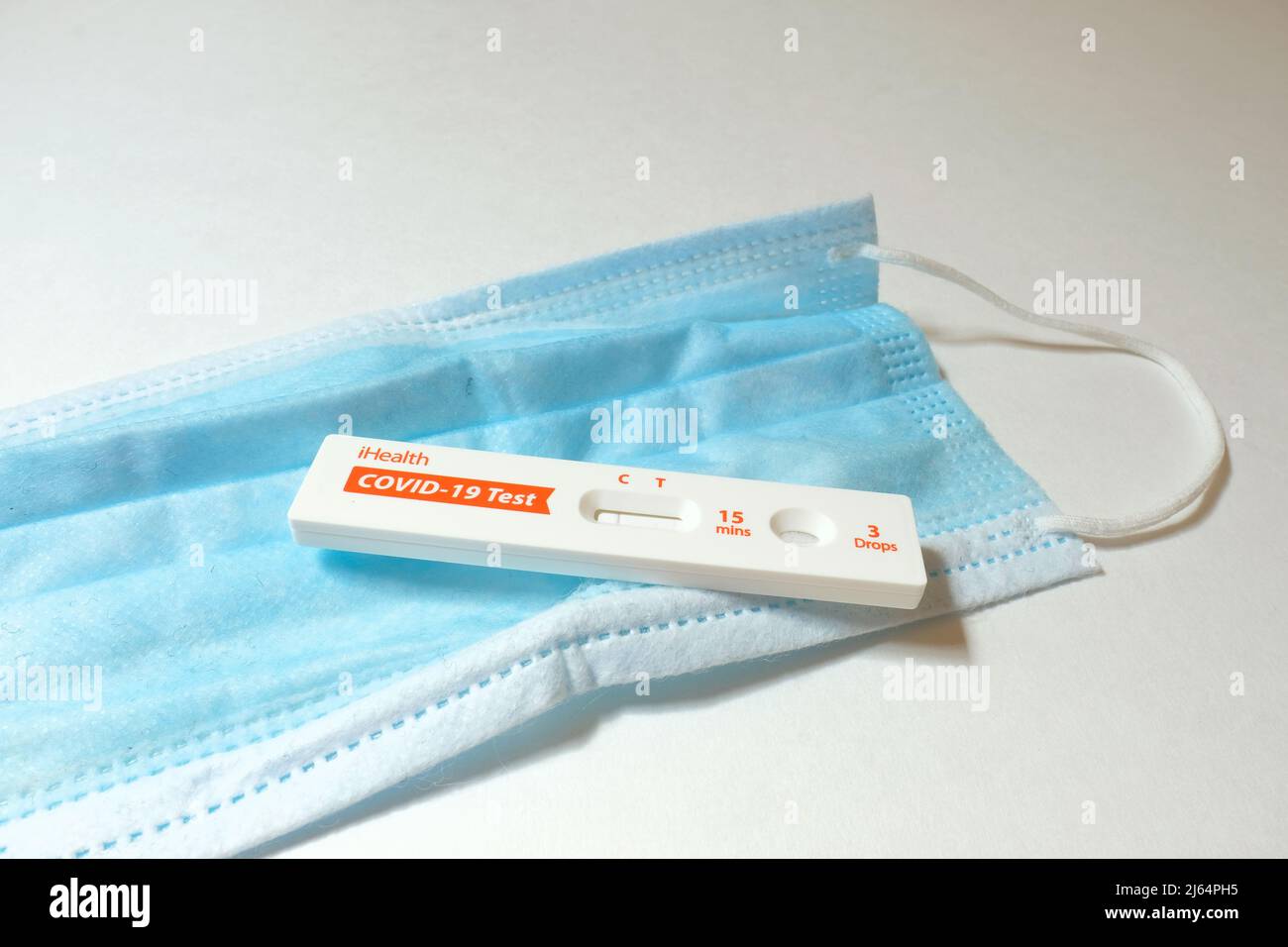 iHealth COVID-19 Antigen Rapid Test in-home self test card displaying a ...