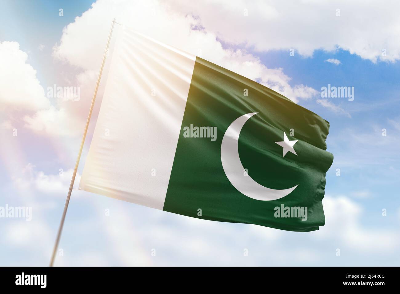 Pakistan flag flying hi-res stock photography and images - Alamy