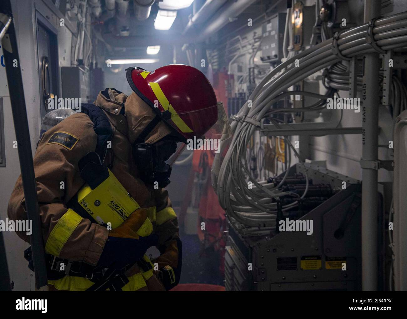 U s navy damage control fireman hi-res stock photography and images - Alamy