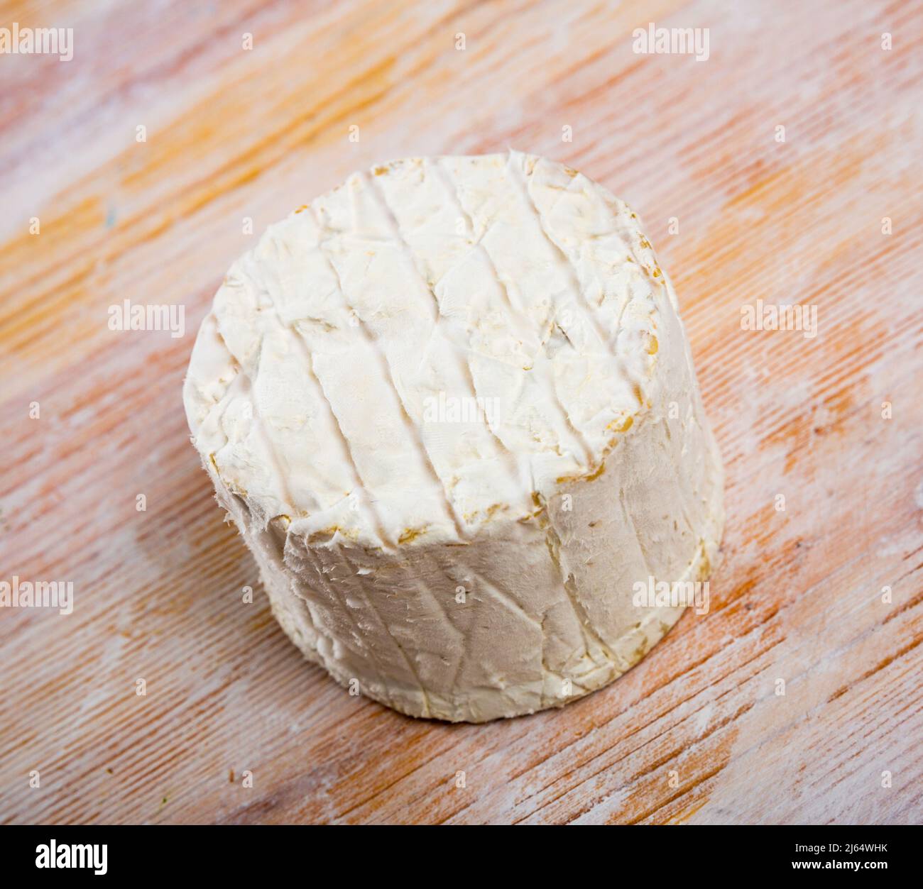 Wheel of creamy blue cheese Stock Photo - Alamy