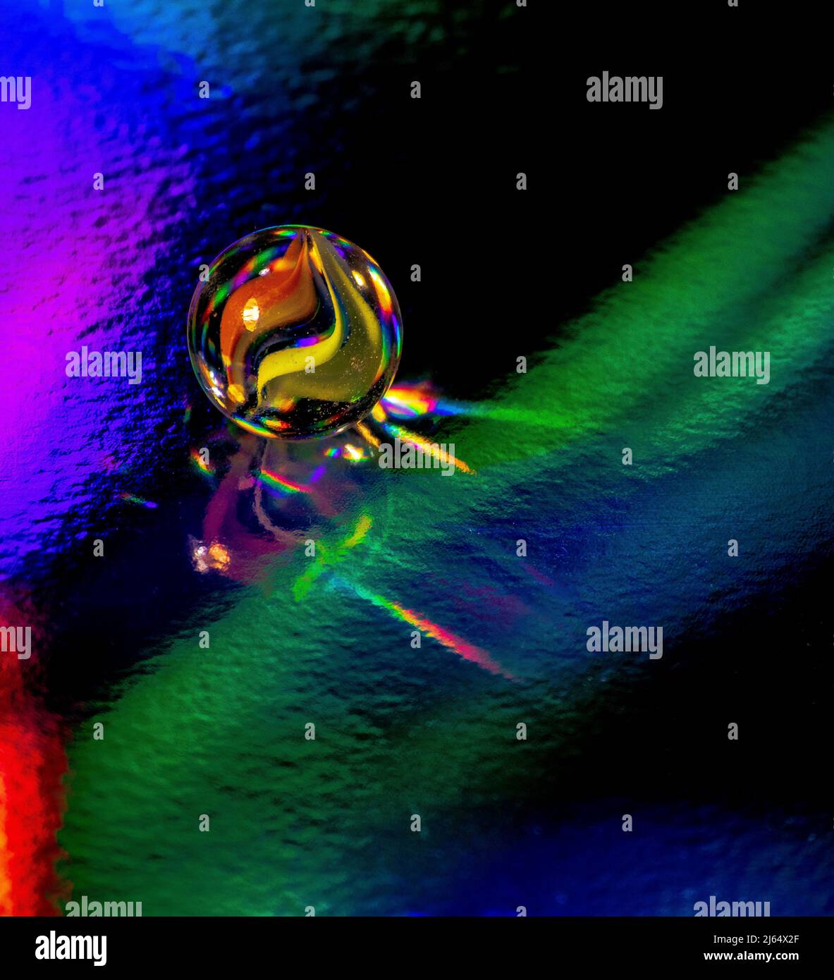 An abstract image of a colorful and shiny Marbles Ball, and its ...