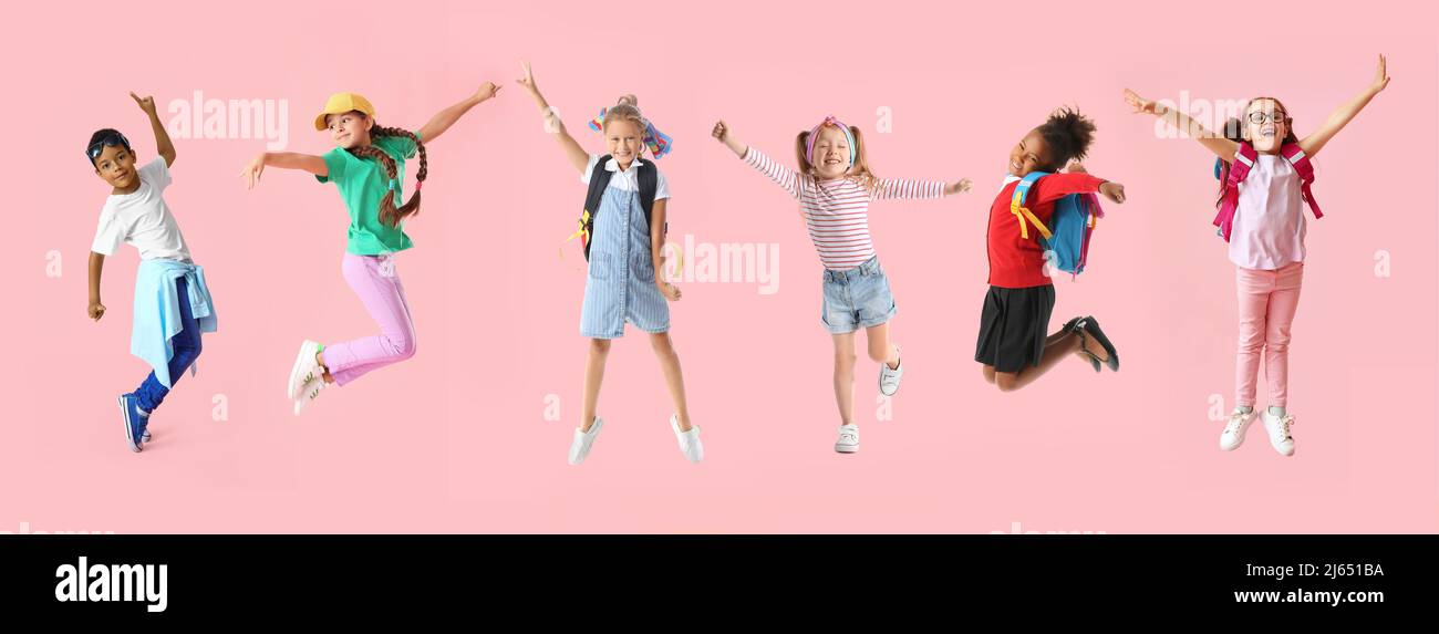 Set of happy little children on pink background Stock Photo - Alamy