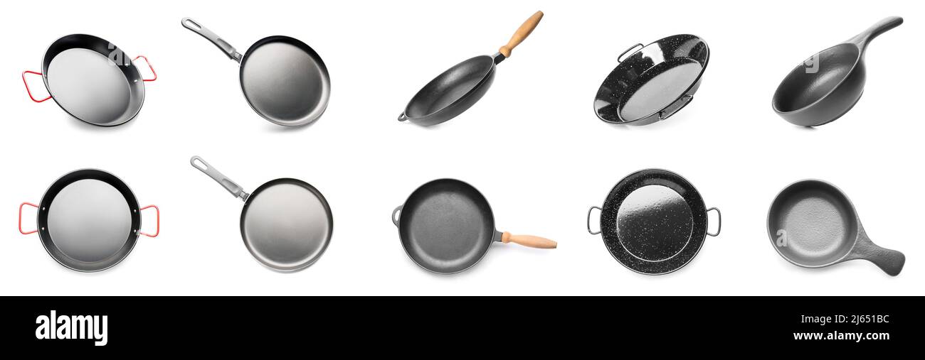 Set of empty frying pans on white background Stock Photo - Alamy