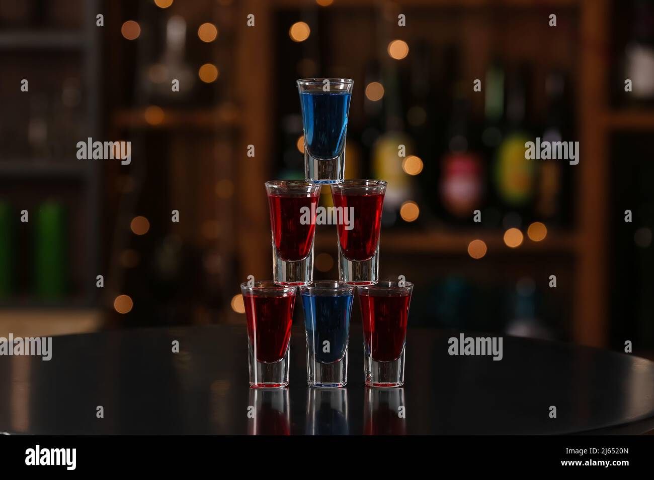 Shot cocktails on table in bar Stock Photo - Alamy