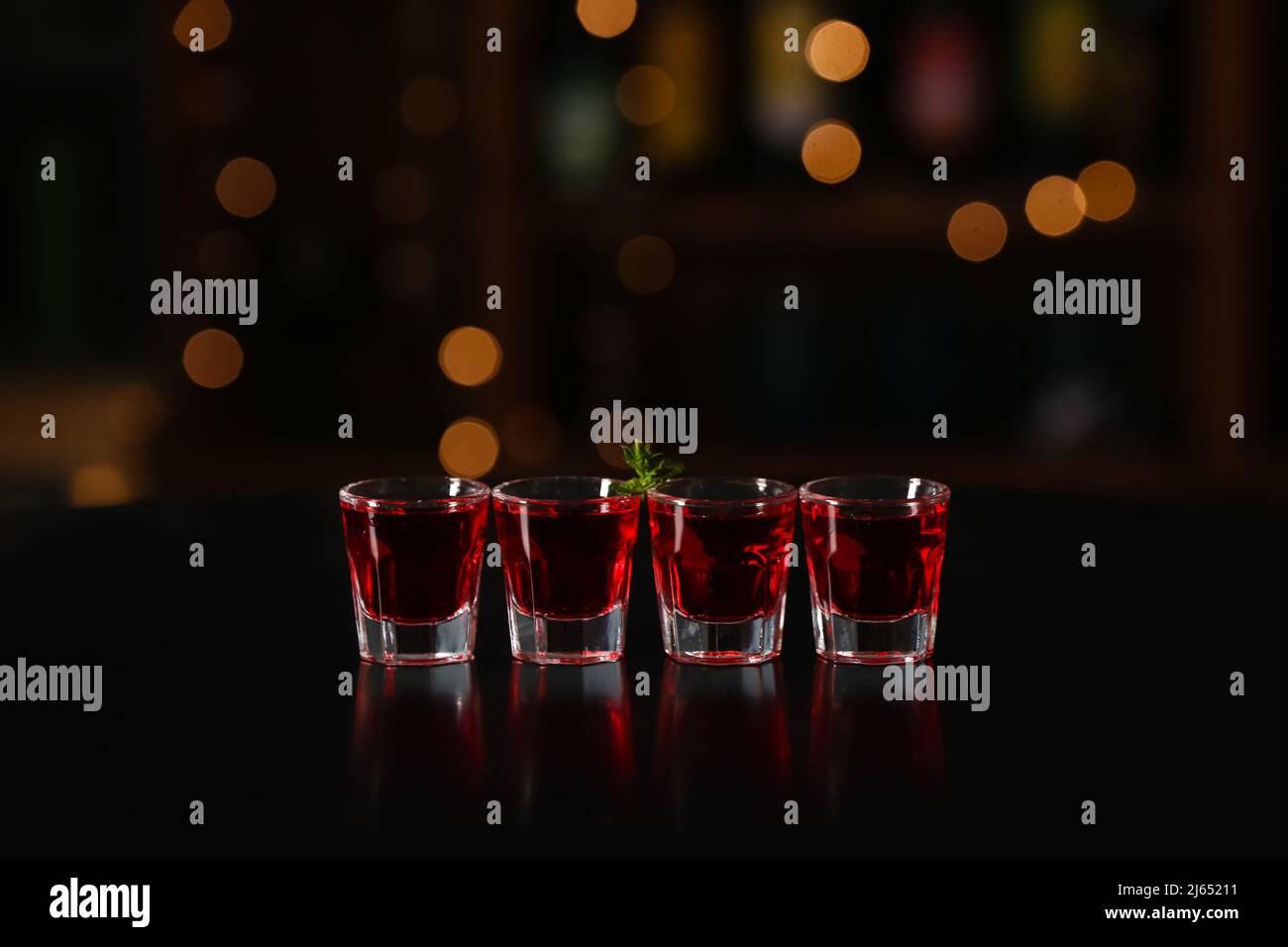 Shot cocktails on table in bar Stock Photo - Alamy
