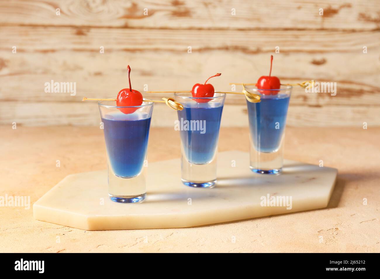 Board with shot cocktails on table Stock Photo - Alamy