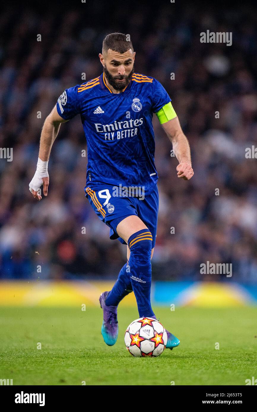 MANCHESTER, ENGLAND - APRIL 26: Karim Benzema of Real Madrid control ...