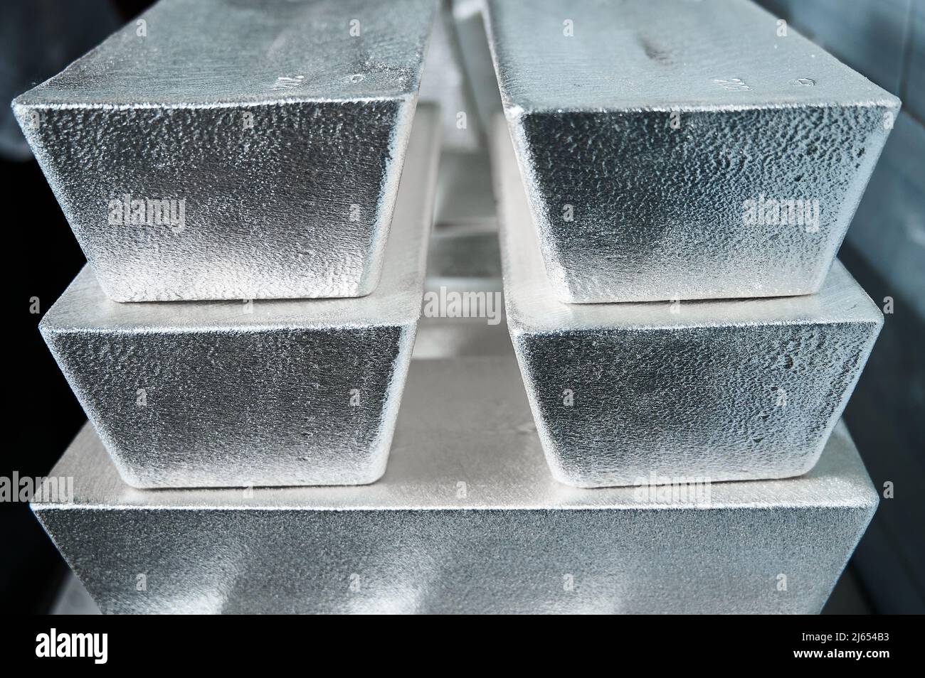 Stack of industrial silver ingots at bright light in storage Stock ...