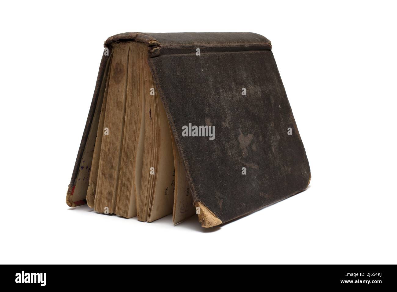 Close up of very old worn partially damaged book with leather cover ...