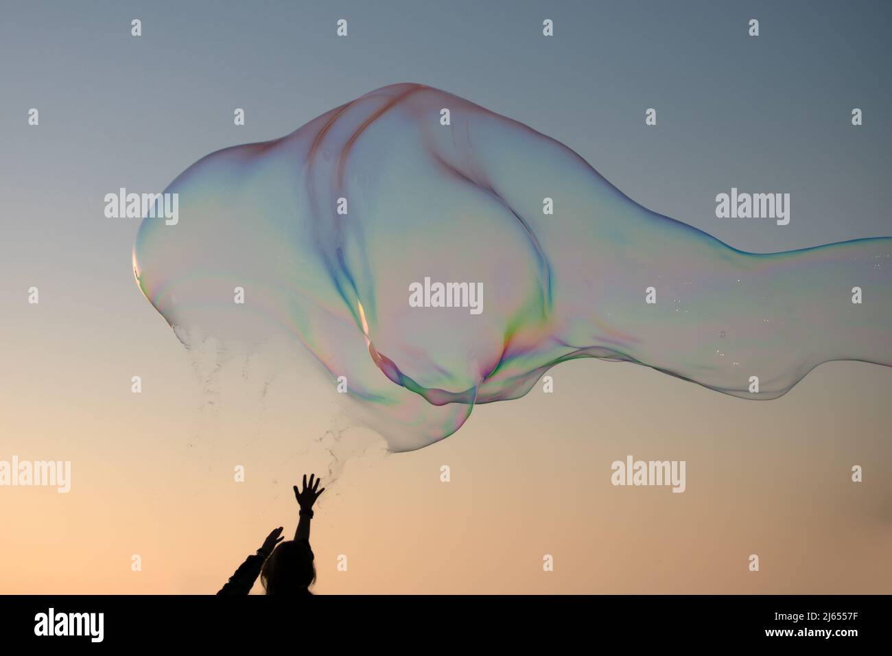 Large bubble floating outdoors hi-res stock photography and images - Alamy