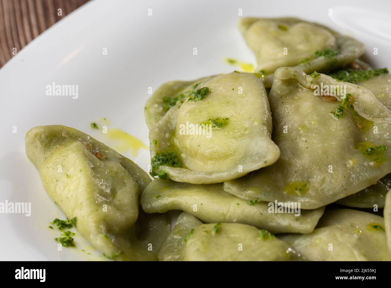 Traditional ukrainian dish vareniki served in a bowl with greaves and ...