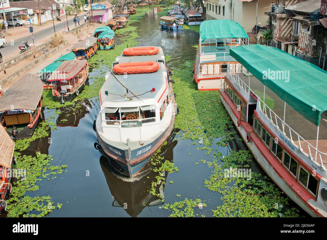 Transport by ferry boat through canal at Alappuzha state Kerala India ...