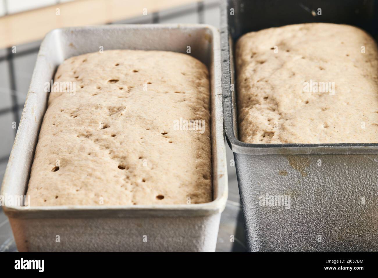 The process of making rye bread. The dough on the rye bread is laid out ...