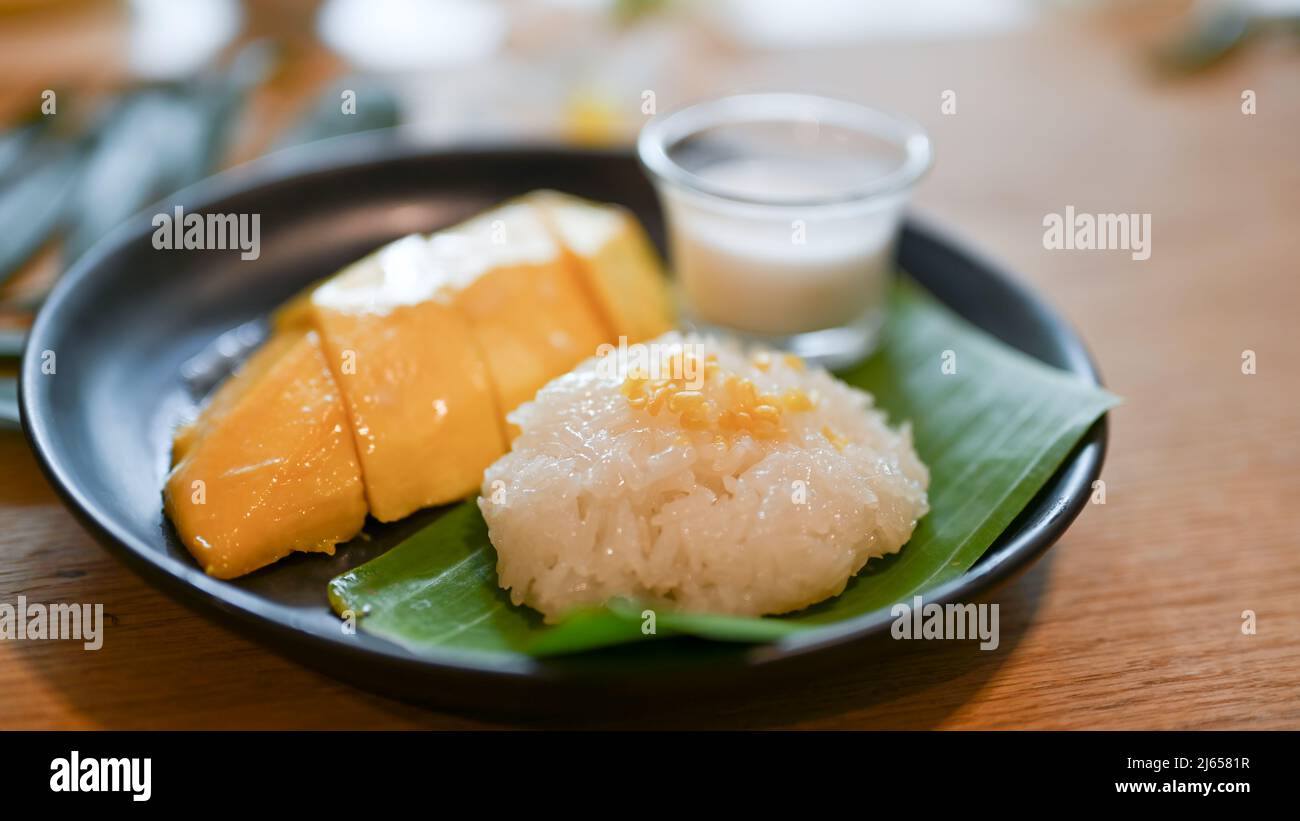 Traditional Thai sweet desserts concept, Mango with sticky rice on a ...