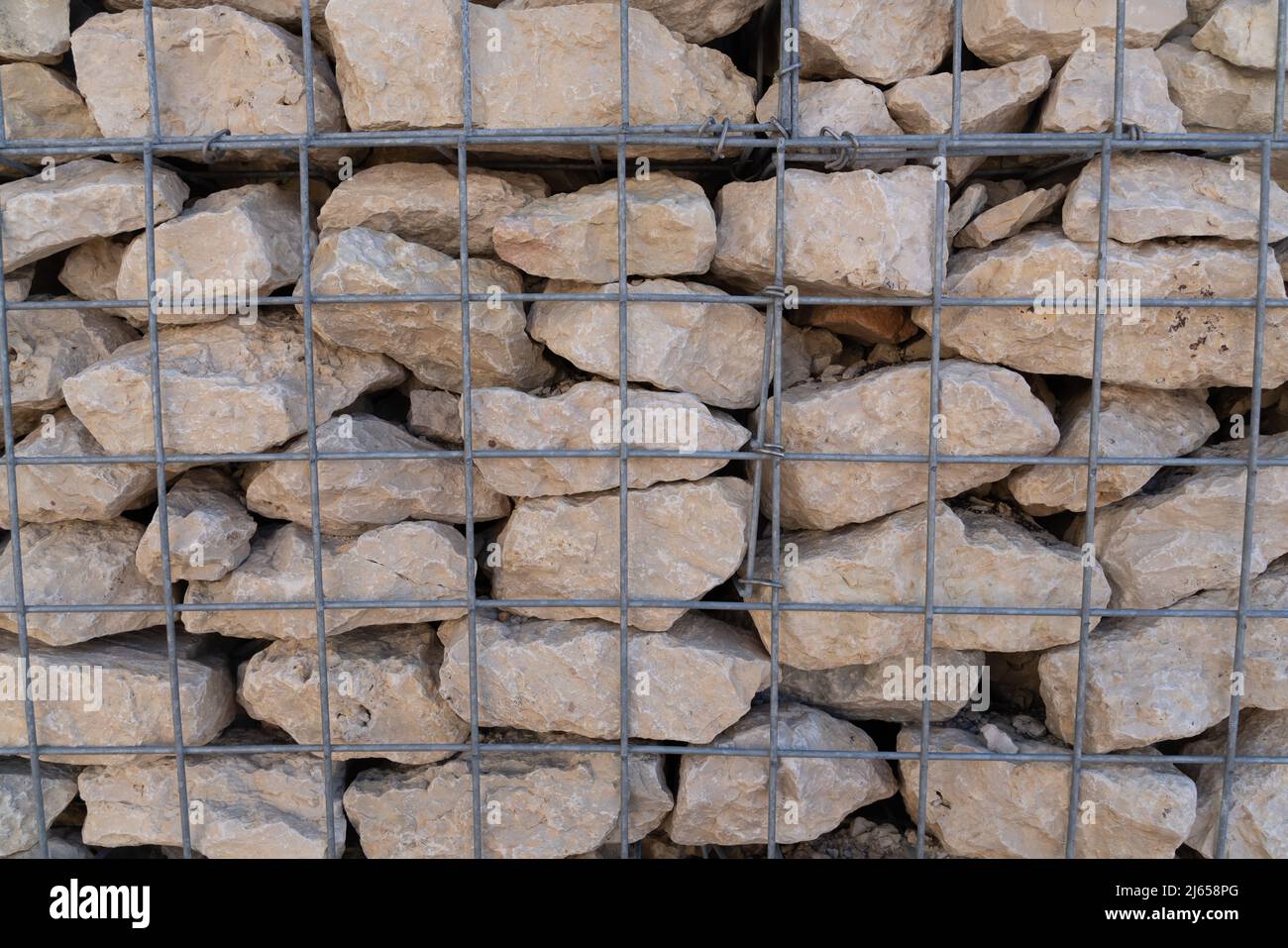 Rocks metal cage hi-res stock photography and images - Alamy