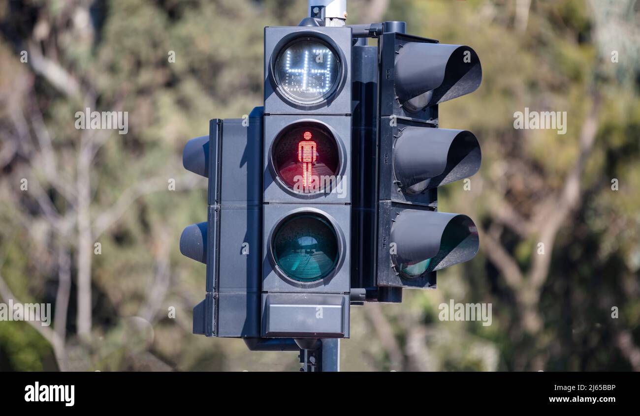 Pedestrian traffic light sign red, do not walk symbol. Stop light and ...