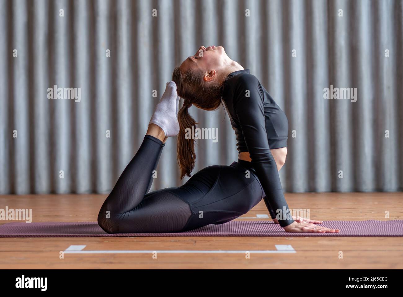 Beautiful young woman arching back hi-res stock photography and images ...