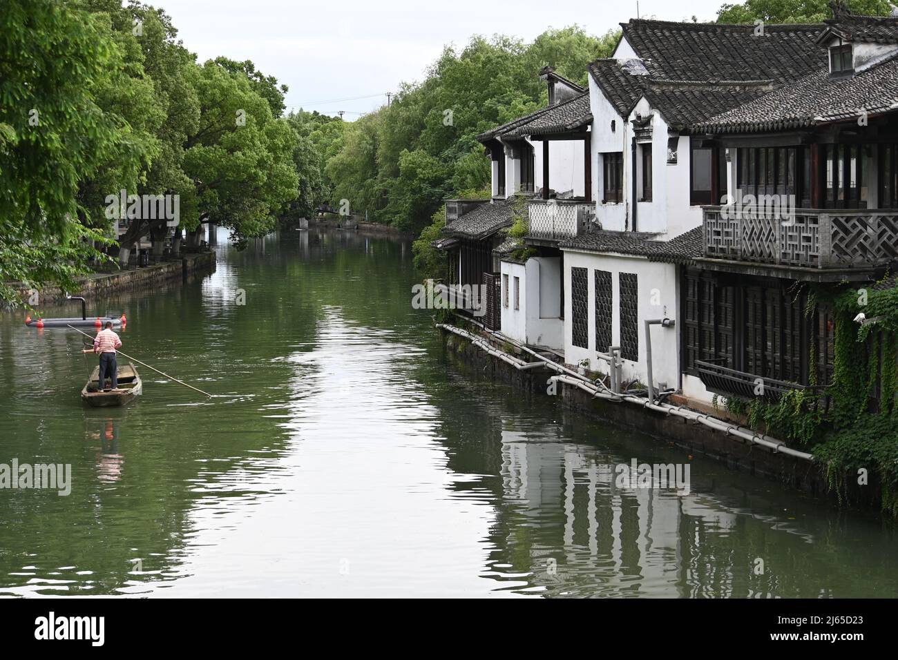 Houses and boats along the canals of the ancient Jinze town Stock Photo ...