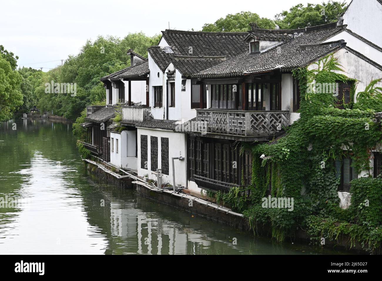 Houses and boats along the canals of the ancient Jinze town Stock Photo ...