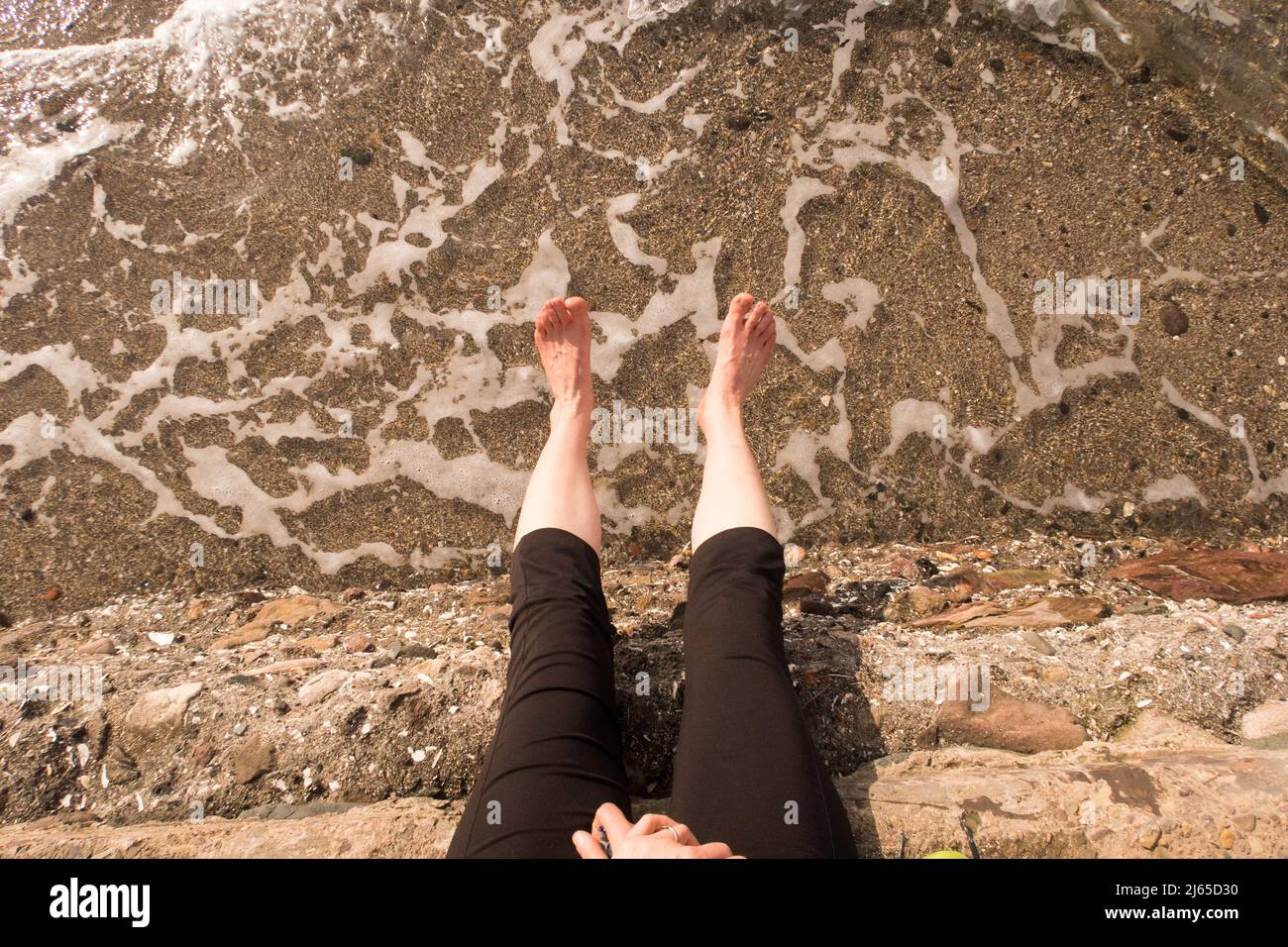 Wet feet sea hi-res stock photography and images - Alamy