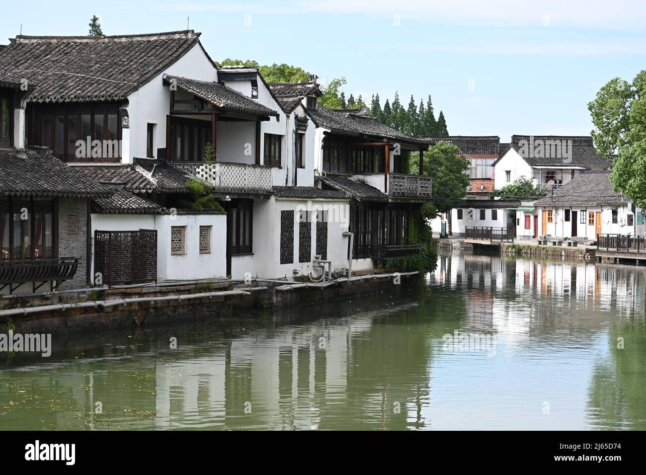 Houses and boats along the canals of the ancient Jinze town Stock Photo ...