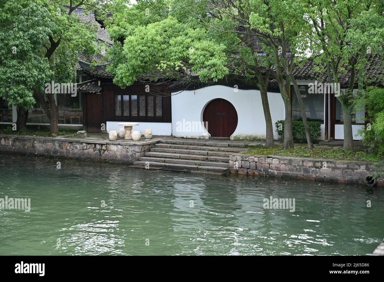 Houses and boats along the canals of the ancient Jinze town Stock Photo ...