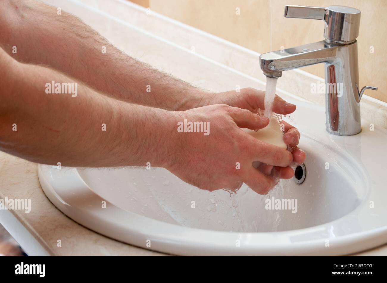 Washing hands rubbing with soap man for prevention and hygiene Stock ...