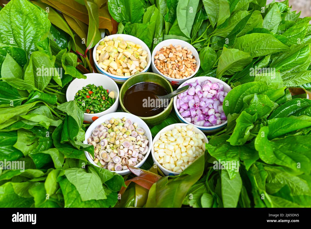 Miang Kham Or wild betel leaves wrap ingredients with lemon grass ...