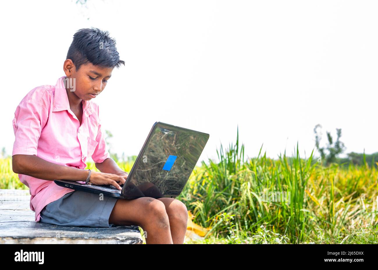 India child boy technology hi-res stock photography and images - Alamy