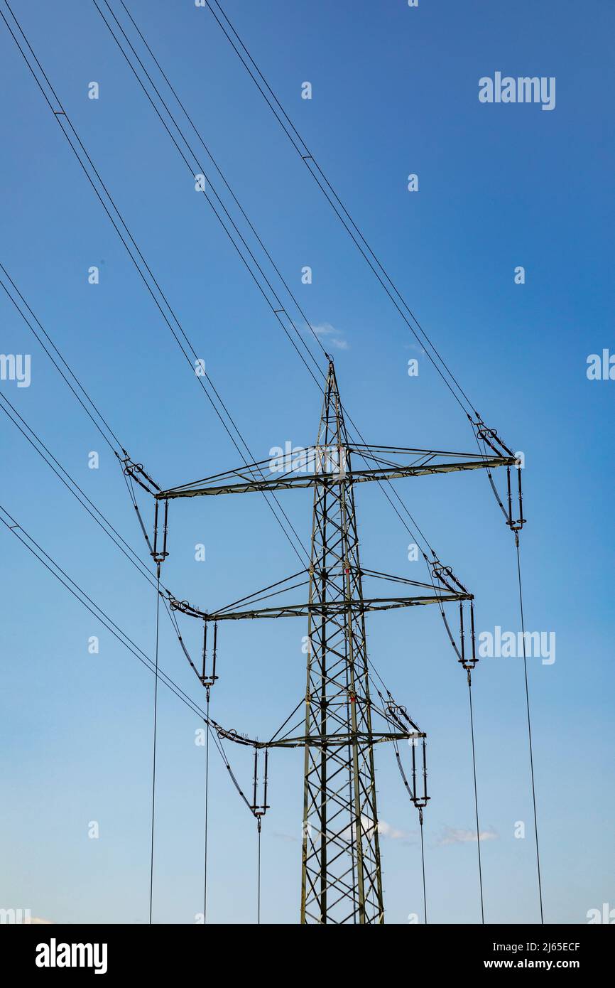 electric pylon for electricity distribution under clear blue sky Stock ...