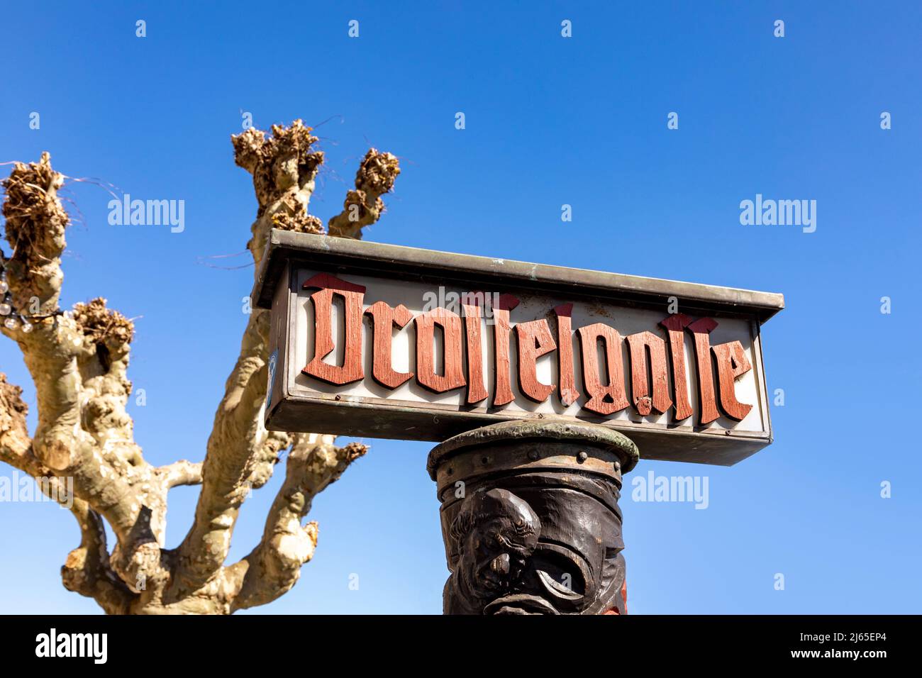 sign Drosselgasse in Ruedesheim, Germany. This narrow street is the ...