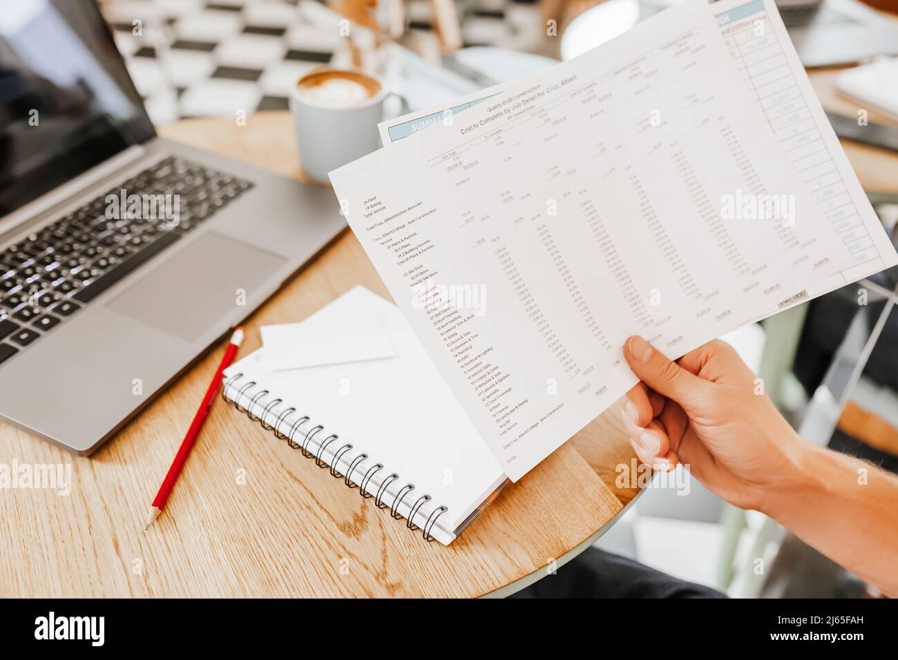 Businessman laptop charts hi-res stock photography and images - Alamy