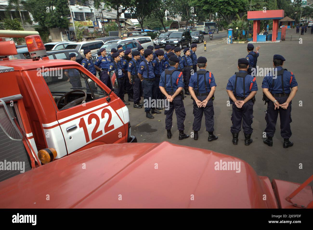Firefighters receiving afternoon briefing at their station in Petojo ...