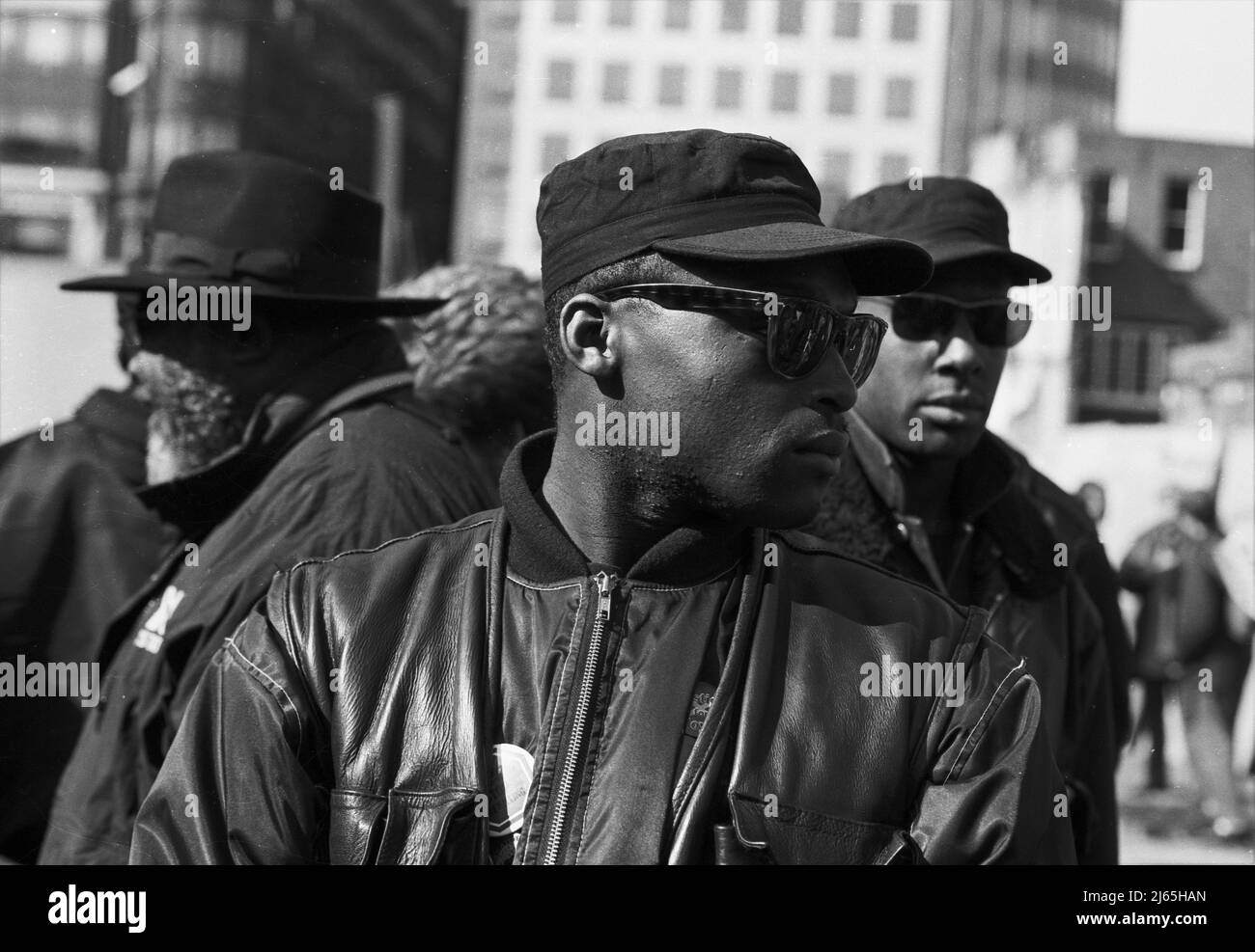 Bernie Grant's minders guarding the MP on a TUC march. East End, London ...